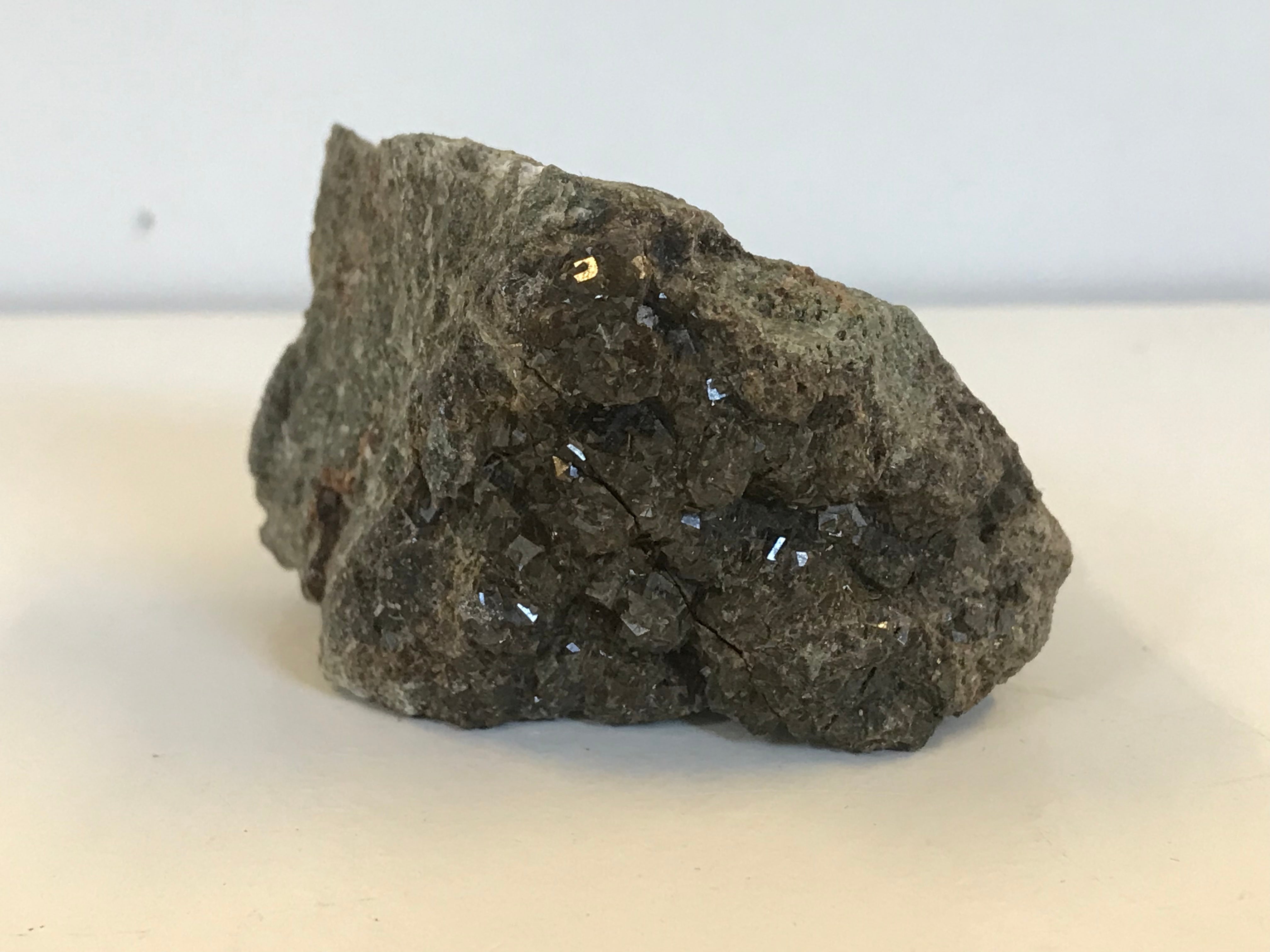 Garnet (Andradite) on rock – Crystal and fossils